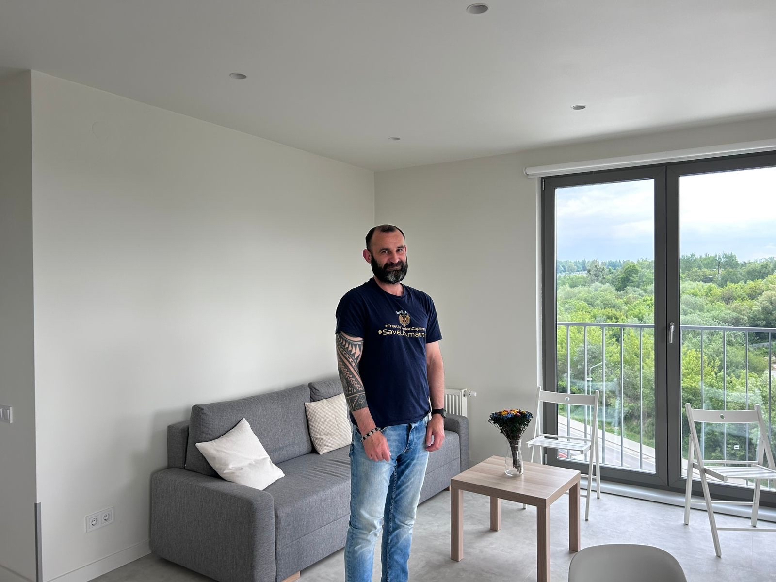 A military medic is one of the new residents of the first building ...